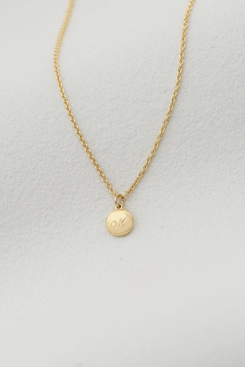 IMPARFAIT // Disc necklace + engraving M // 10k gold – Maksym Joaillerie